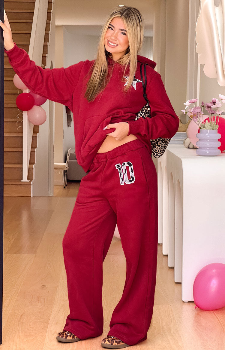 Dania Burgundy Leopard Star Track Pants | Beginning Boutique US
